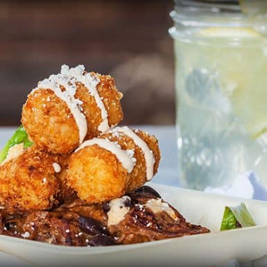 Cuban-style braised beef, Mexican-style potato and corn croquettes