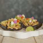 Purple Potato Skin Tostaditas with Carnitas, Guacamole, Veggies